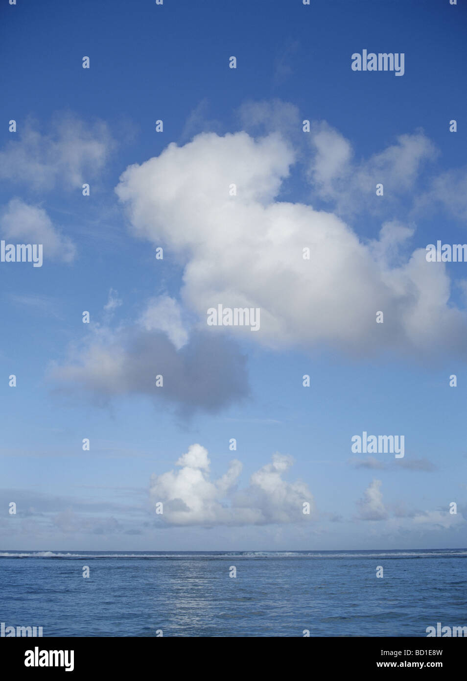 Blue sky, clouds and ocean Stock Photo - Alamy