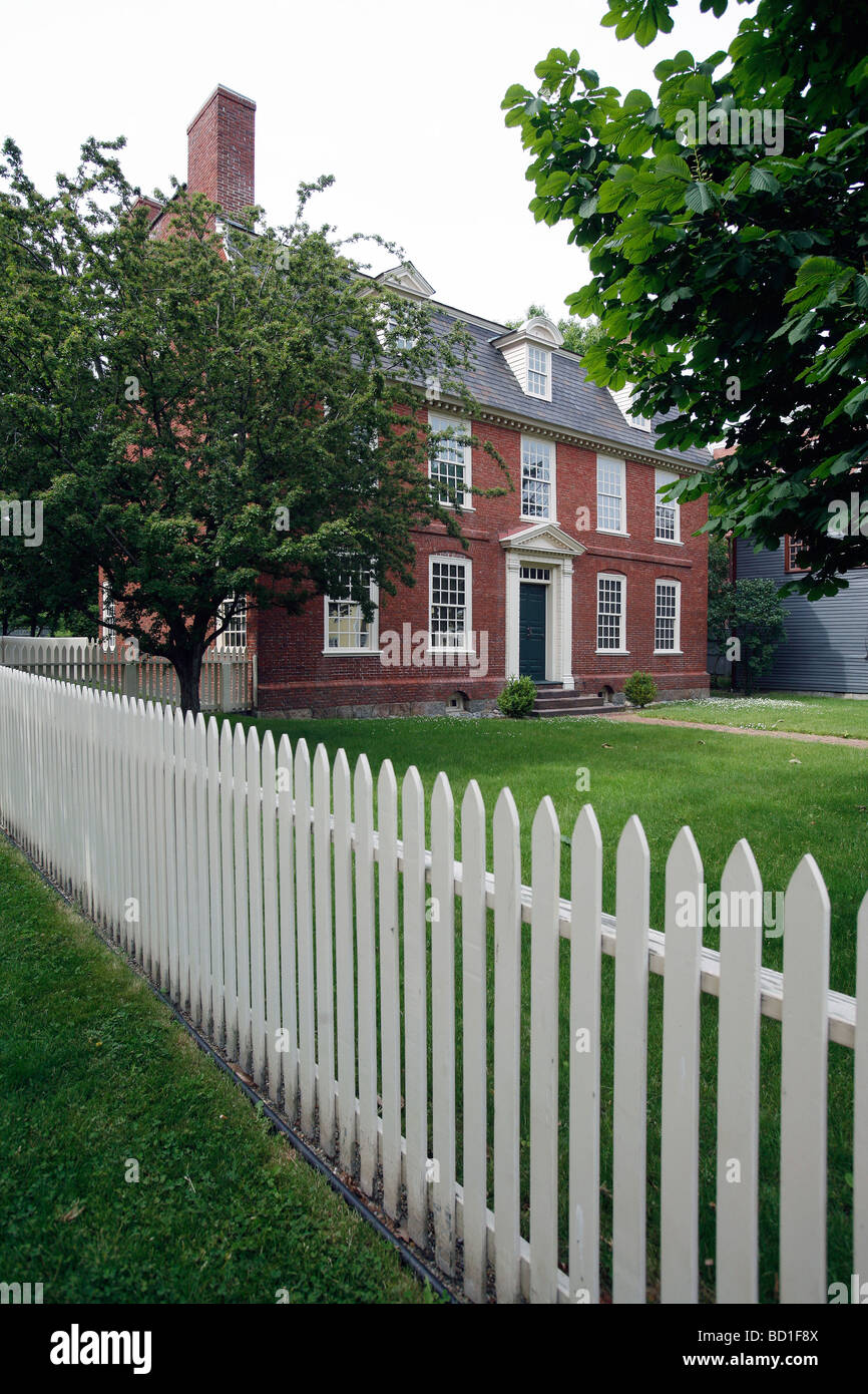 Brick House With Picket Fence Garden