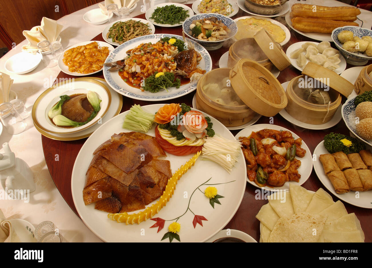 Chinese dishes on table Stock Photo - Alamy
