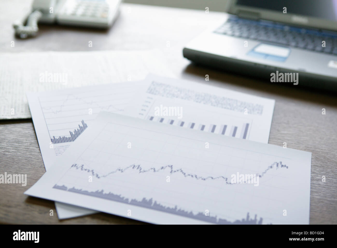 Rising line graph on papers Stock Photo - Alamy