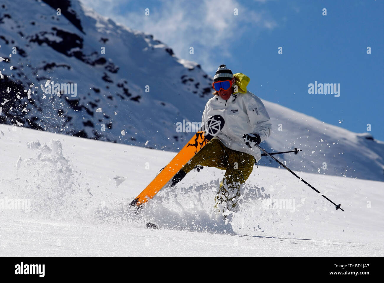 Skier falling down while going downhill in Austria Stock Photo - Alamy