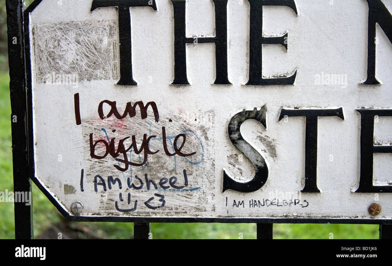 Street sign for the "The North Steps" in Edinburgh. Humorous graffiti ...