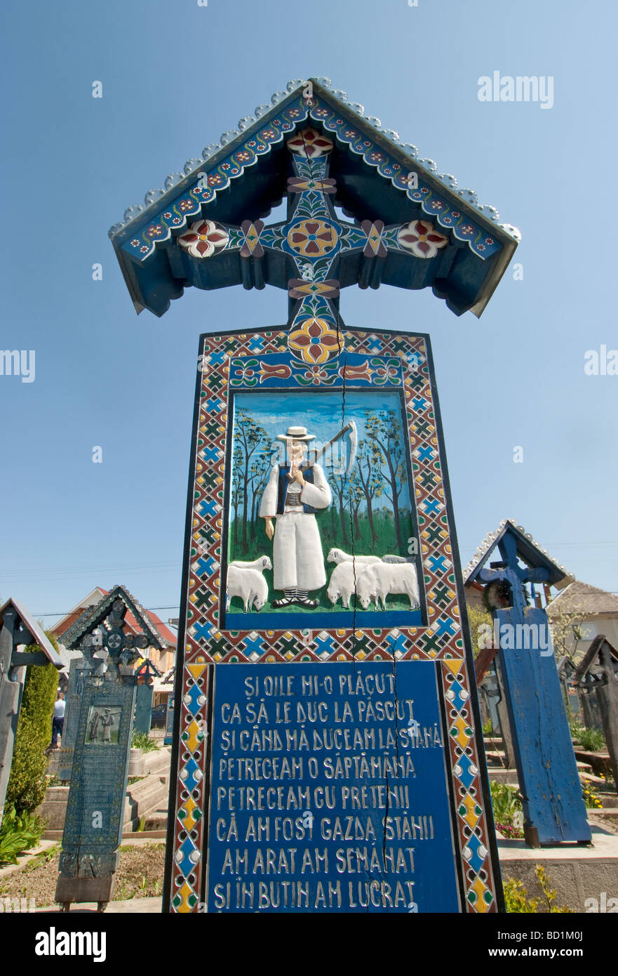 Carved cross marking grave of a shepherd in the Merry Cemetery in ...
