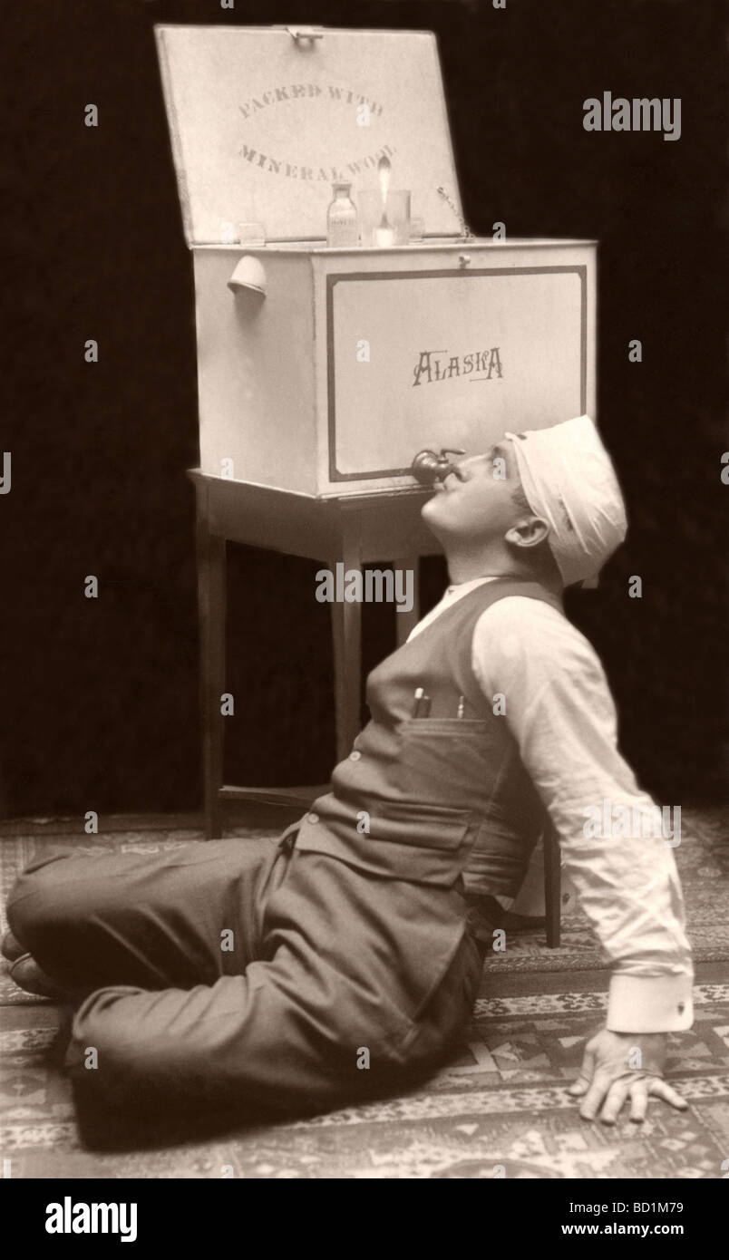 Injured Man Drinking from Box of Mineral Water Stock Photo - Alamy