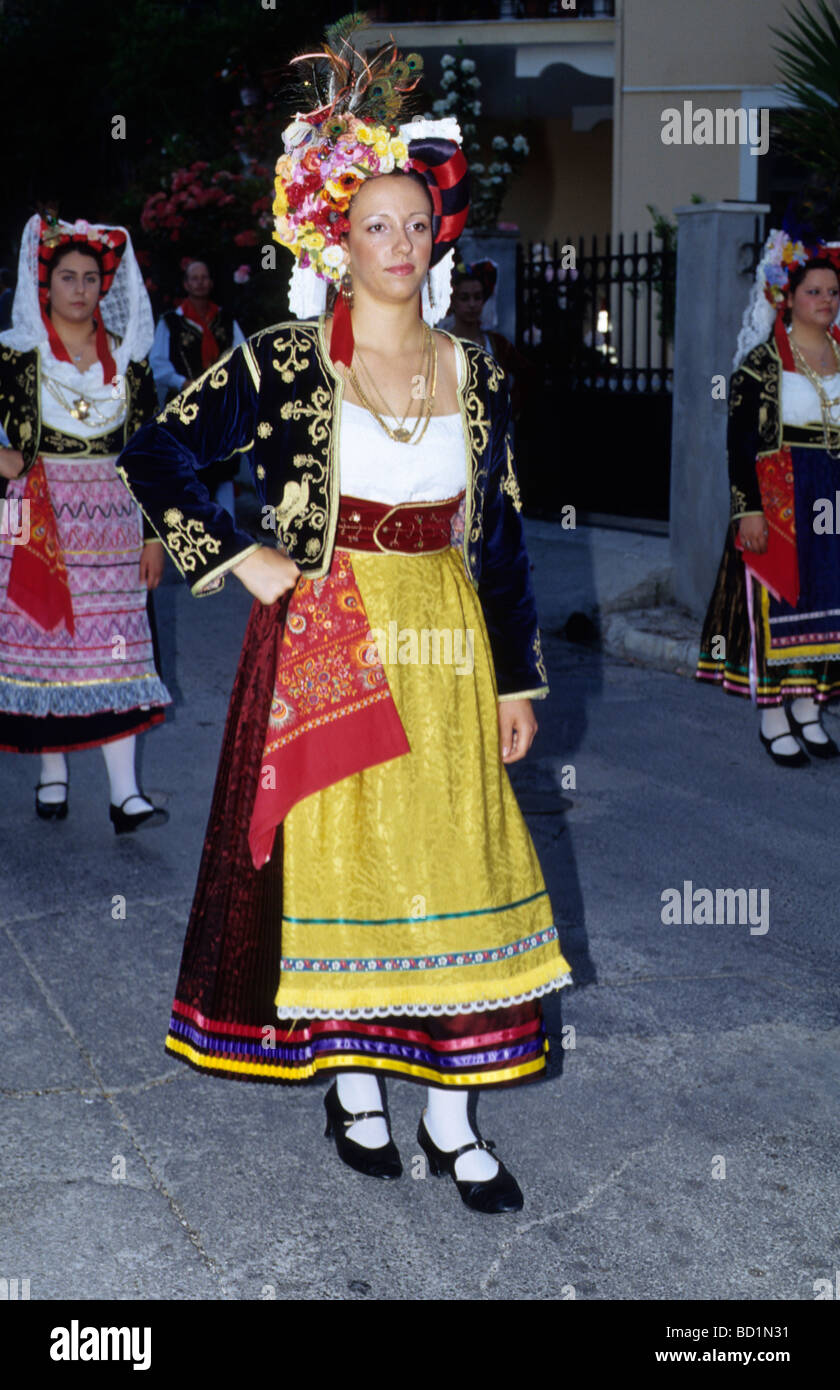 Woman in traditional costume during a religious procession, Potamos ...