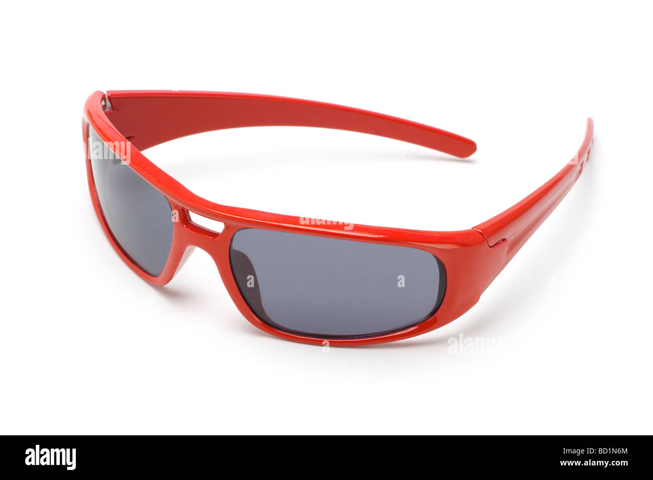 Red toy sunglasses on white background Stock Photo - Alamy