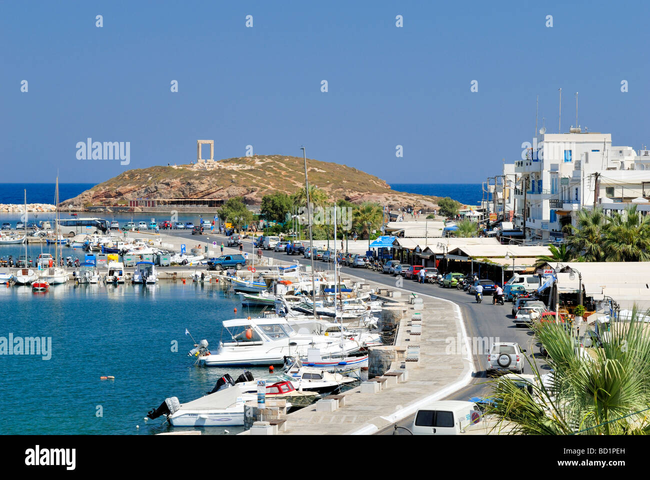 A fine view to the harbour of Naxos town and Protopapadaki "Paralia ...
