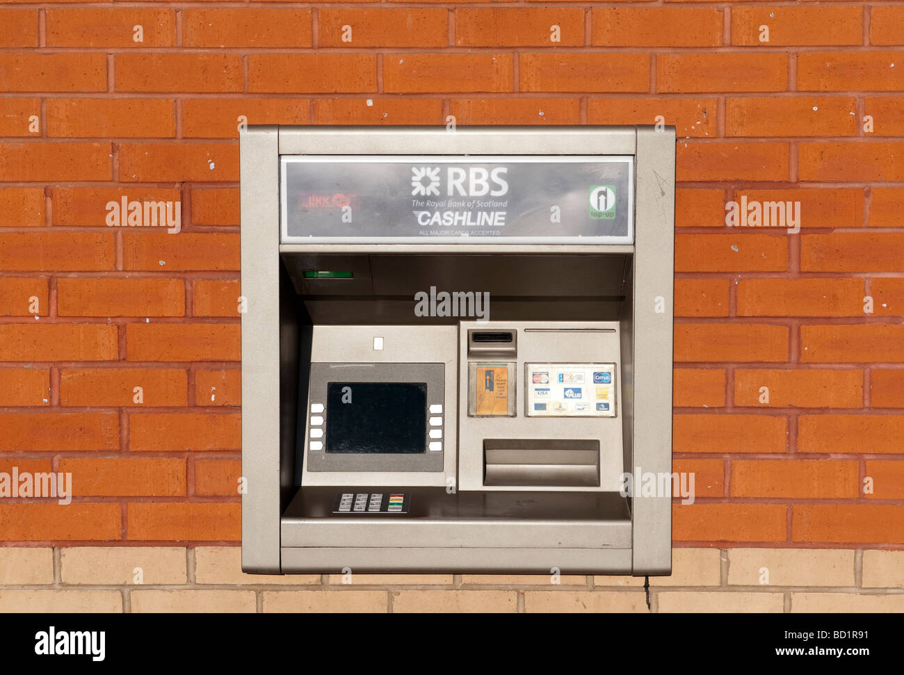 "Cash machine" built into a "brick wall" automated teller ATM Stock Photo - Alamy