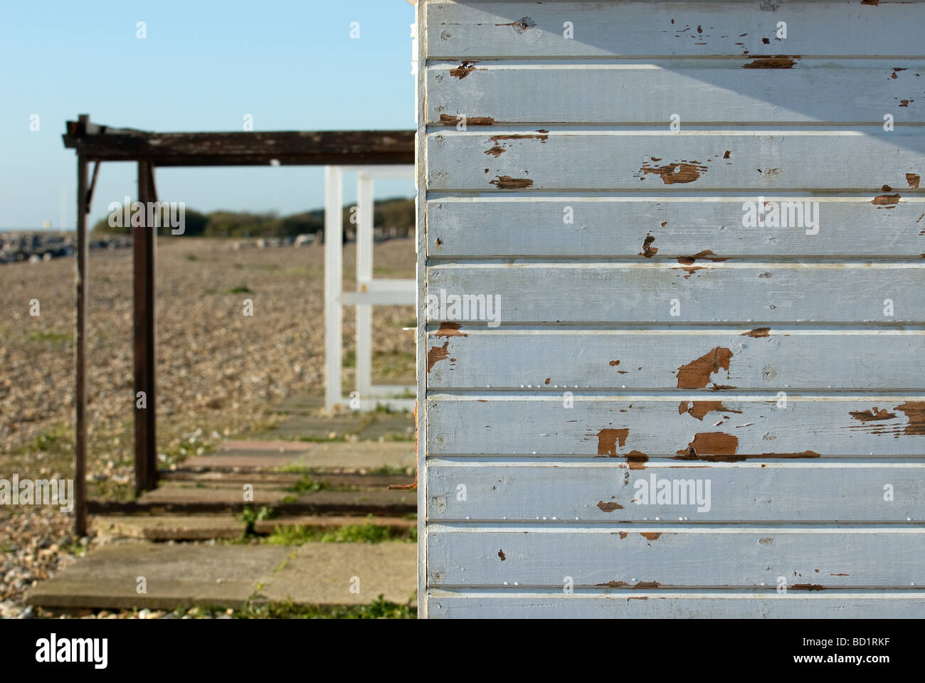 deserted beach huts at Worthing beach Stock Photo - Alamy