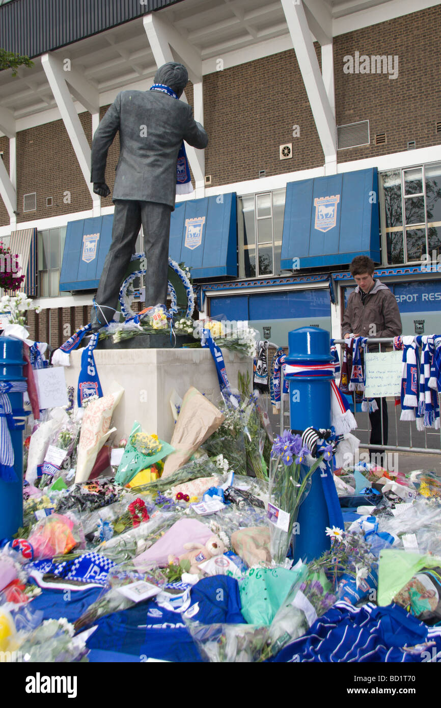 A fan pays his respects at the statue of Sir Bobby Robson outside ...
