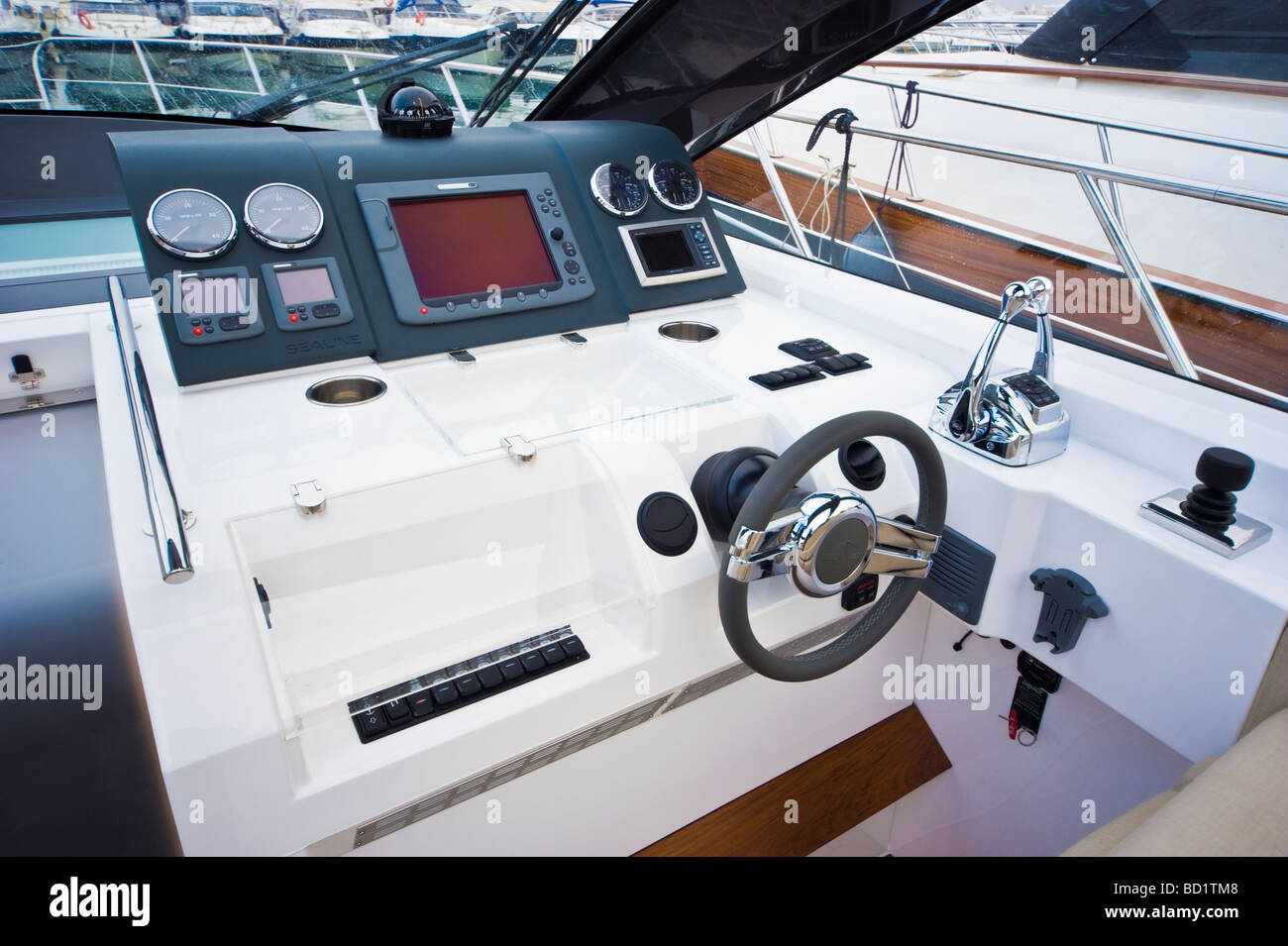 Helm with navigational instruments of a Sealine SC 47 powerboat with ...