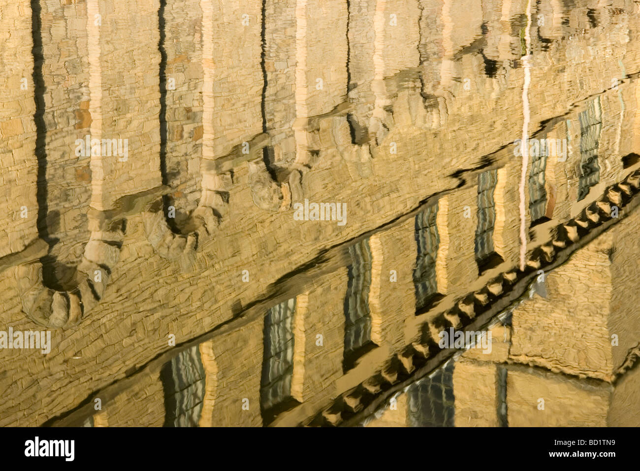 Reflection of the buildings at Salts Mill, Saltaire, a UNESCO world ...