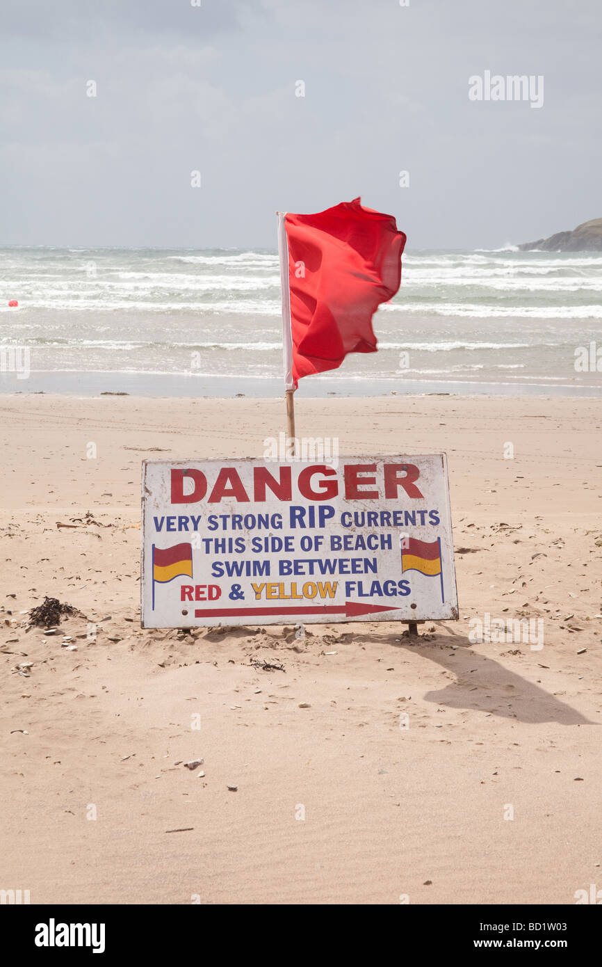 Lifeguard flags at Bantham Beech Devon England Stock Photo - Alamy