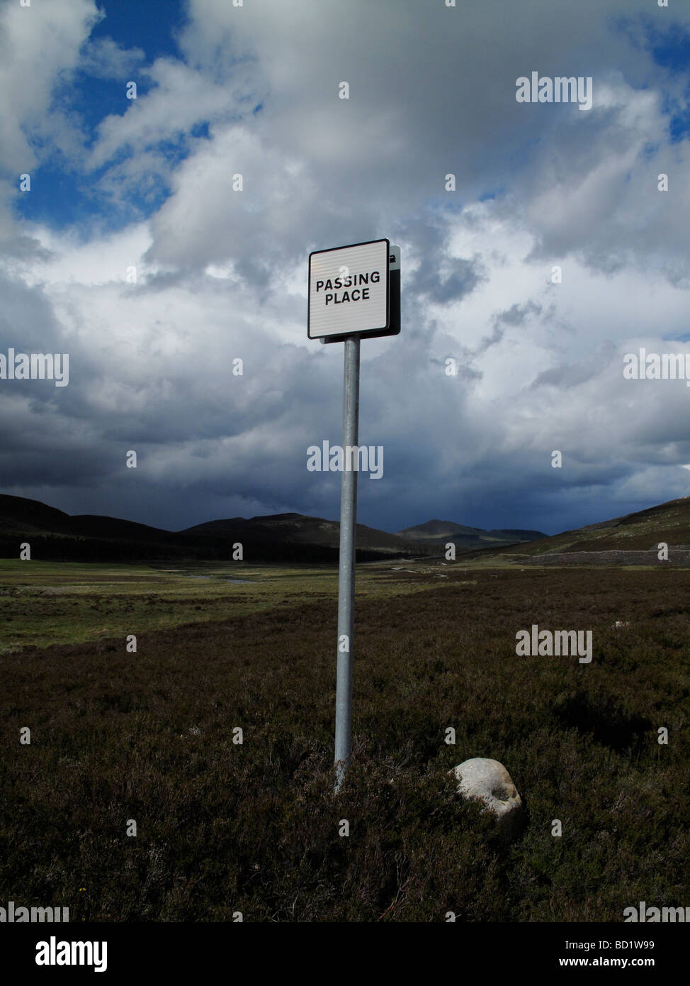 A sign indicating a passing place on a single track road in the ...