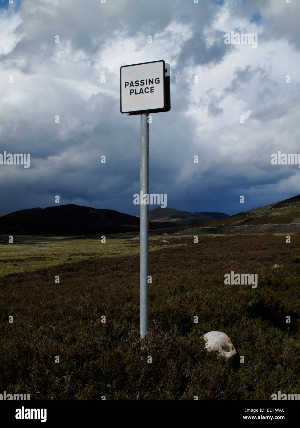 A sign indicating a passing place on a single track road in the ...