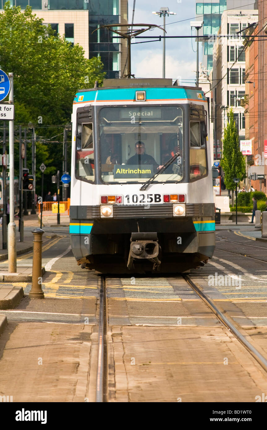 An on coming Metrolink tram in the city centre, Manchester Stock Photo ...