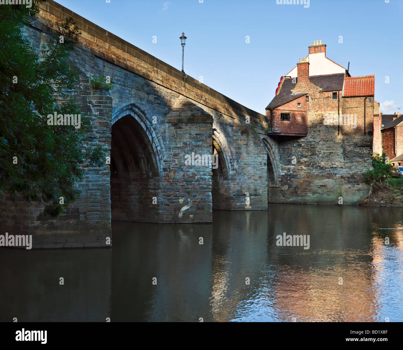 The arches of the Elvet Bridge over the River Wear in the city of ...