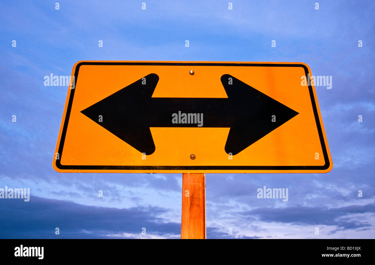 Road traffic sign two arrows hi-res stock photography and images - Alamy