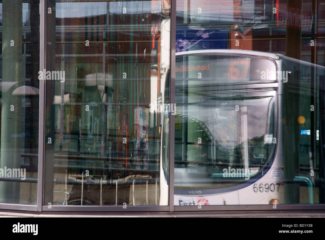Distorted reflections in Bus Station windows Stock Photo - Alamy