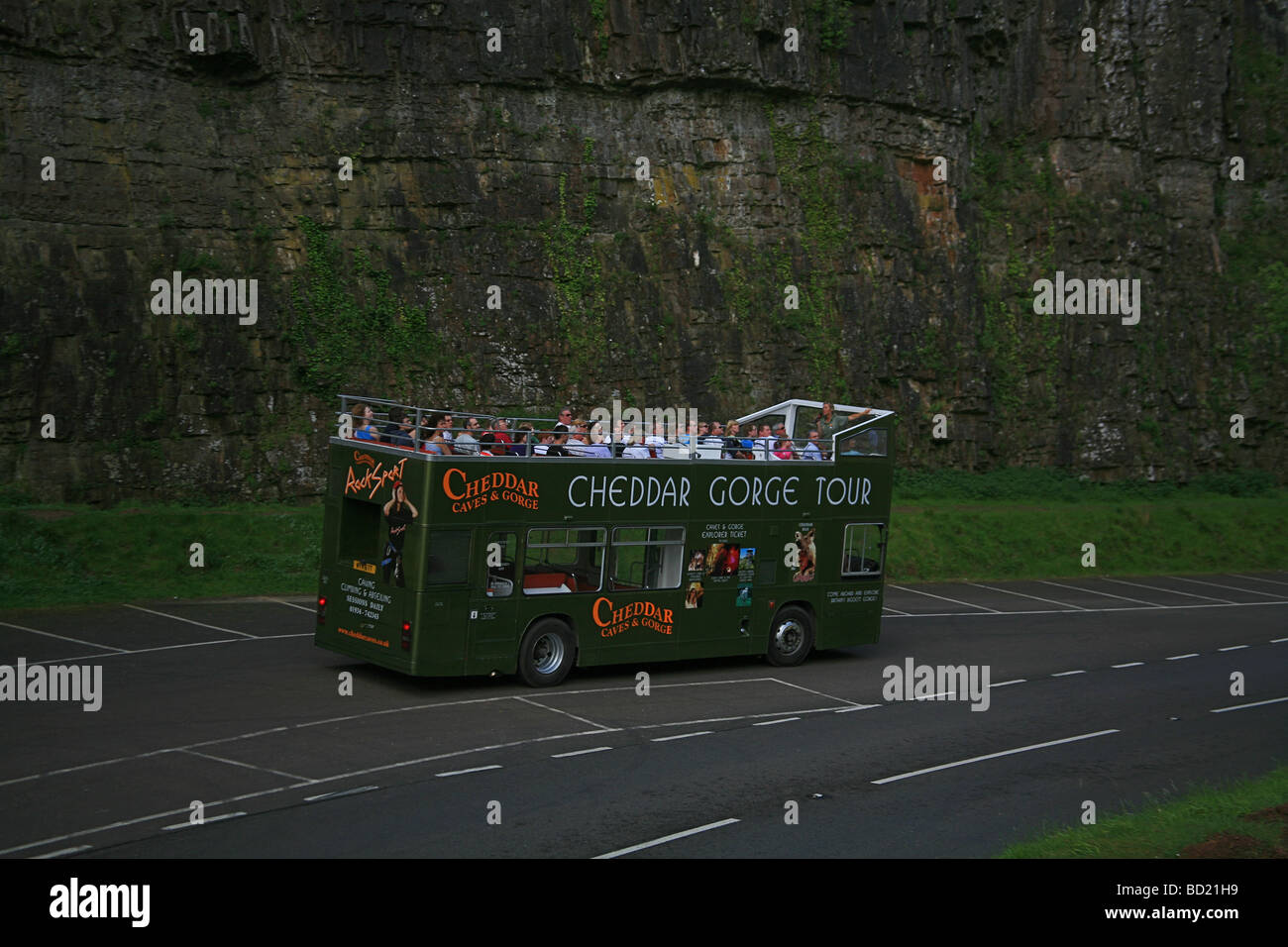 The Cheddar Gorge tour bus makes it way through the gorge with visitors ...