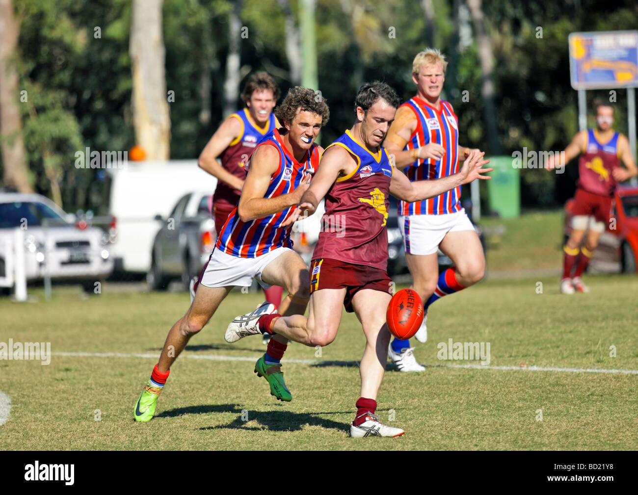 Australian Rules Football being played by two teams in a competition ...