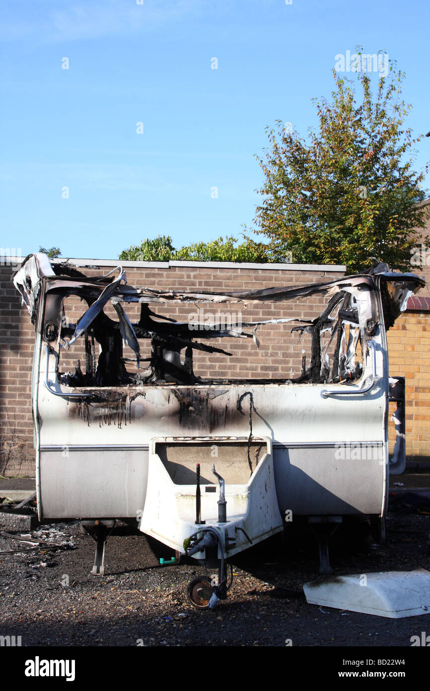 Burnt out caravan on street hi-res stock photography and images - Alamy