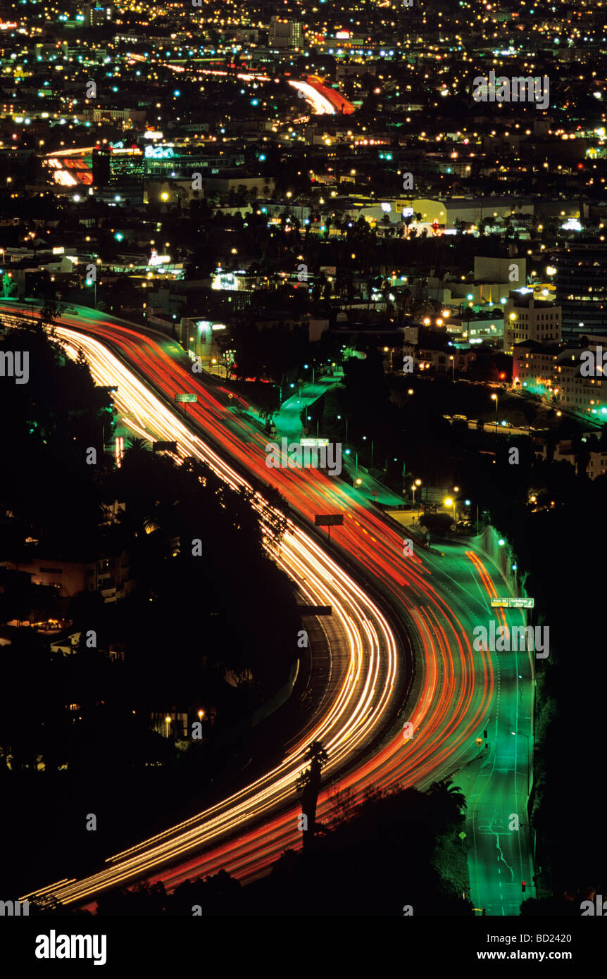 Retro Image 1990's Sunrise over LA with car light streaks on Highway ...