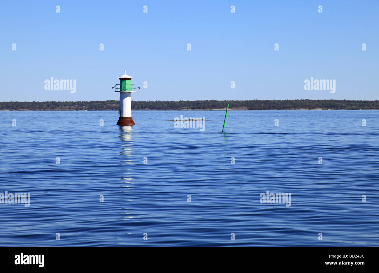 lighthouse in sea Stock Photo - Alamy