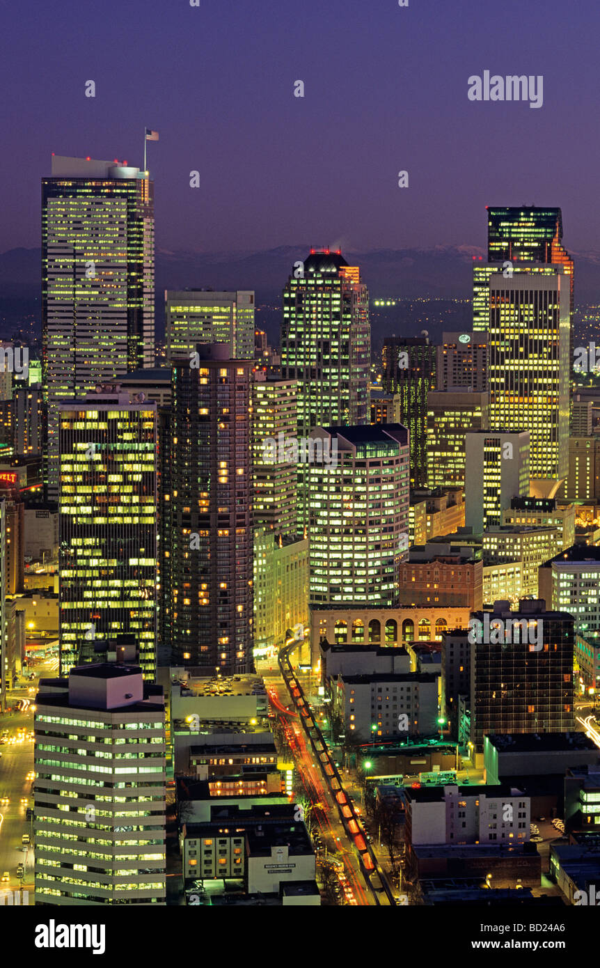 Retro image of Seattle skyline illuminated at dusk with city lights ...