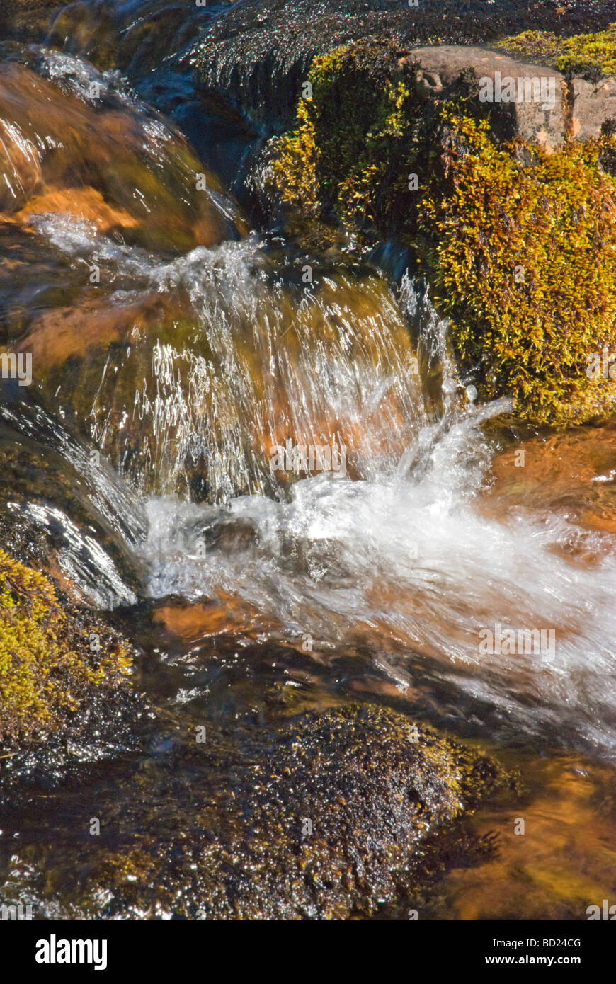fresh water falling over rocks Stock Photo - Alamy
