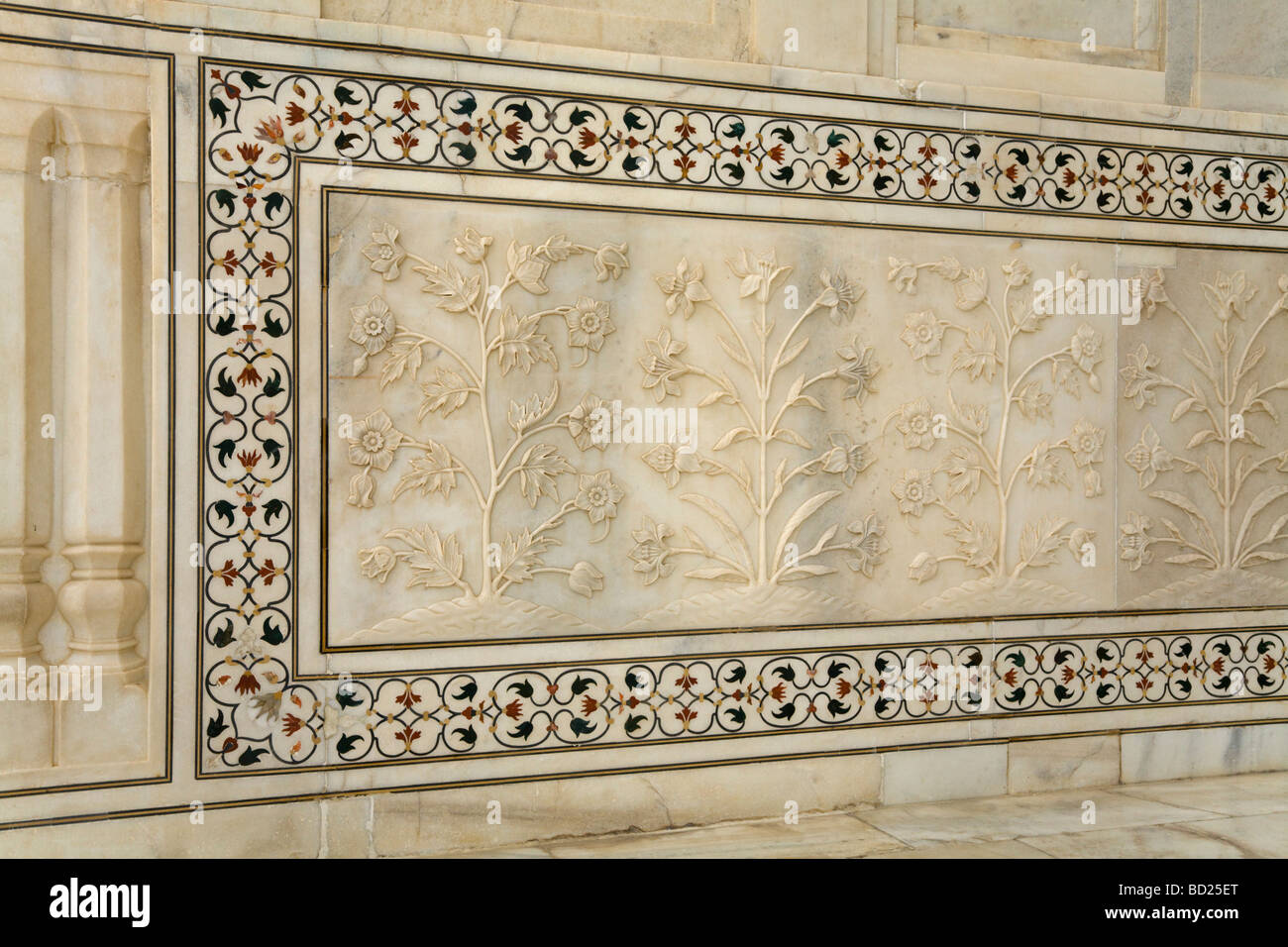 Stone wall of the Taj Mahal mausoleum made from marble & decorated with ...