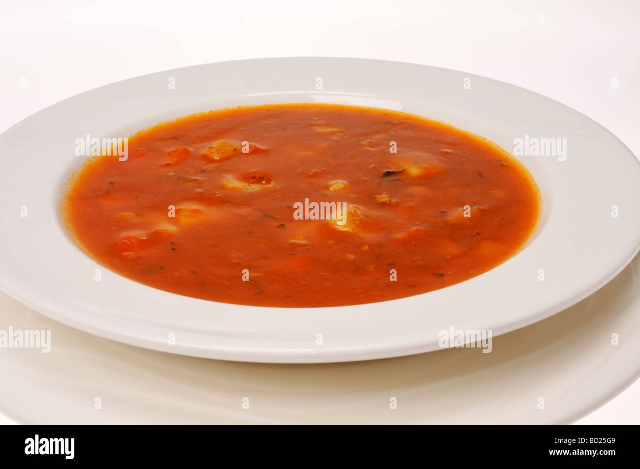 Bowl of Manhattan clam chowder made with a tomato base and vegetables ...