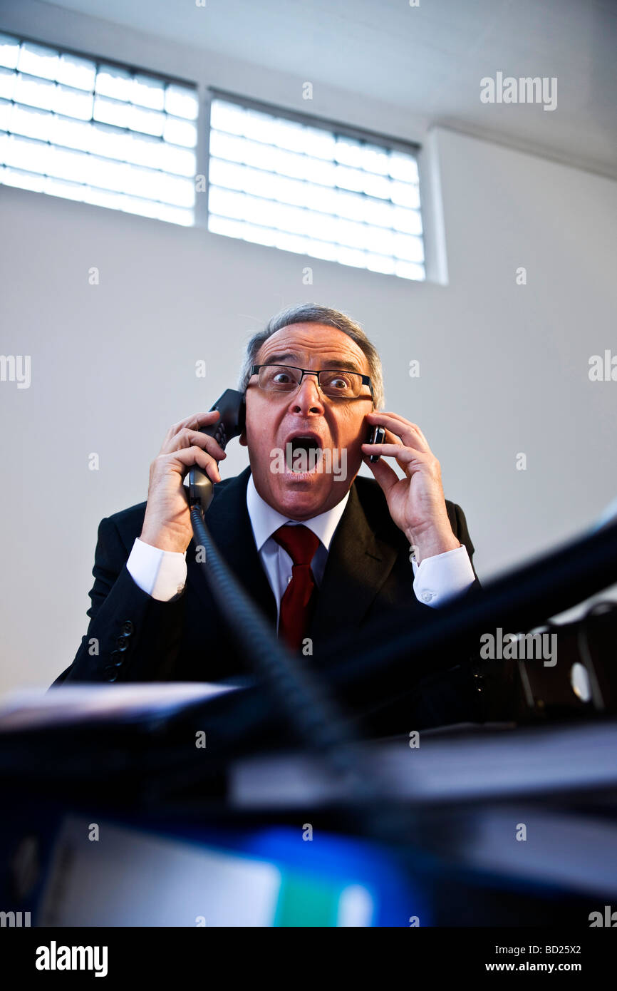 Person speaking angrily on phone hi-res stock photography and images ...
