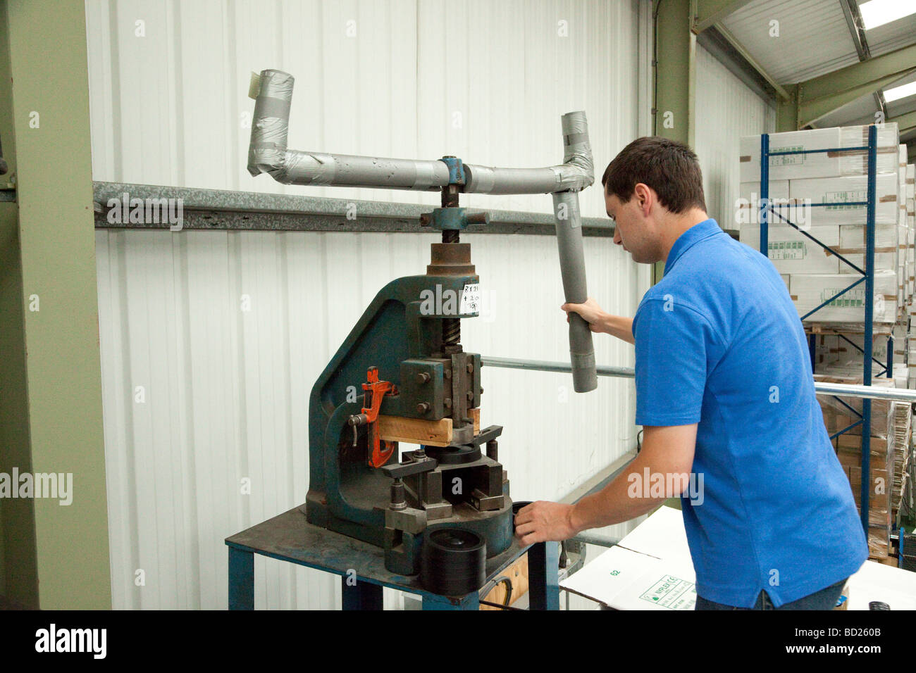 man using a fly press Stock Photo - Alamy