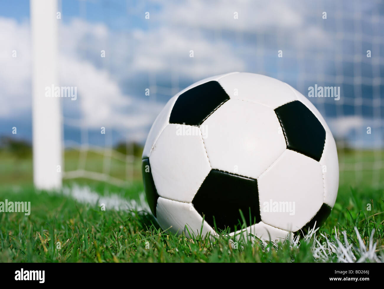 Soccer ball in the goal net Stock Photo - Alamy