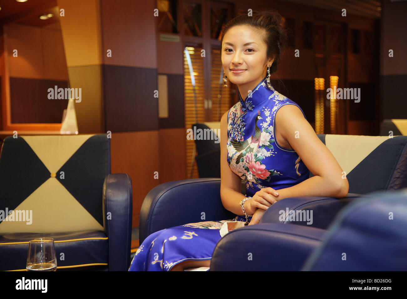 Chinese woman dressing in evening wear Stock Photo - Alamy