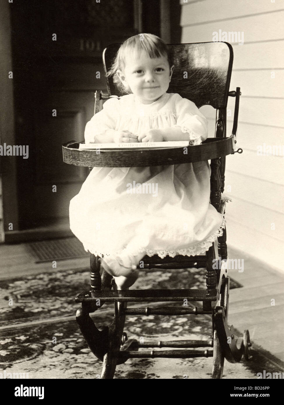 Cosmo Girl Infant with Cosmopolitan Magazine Stock Photo - Alamy