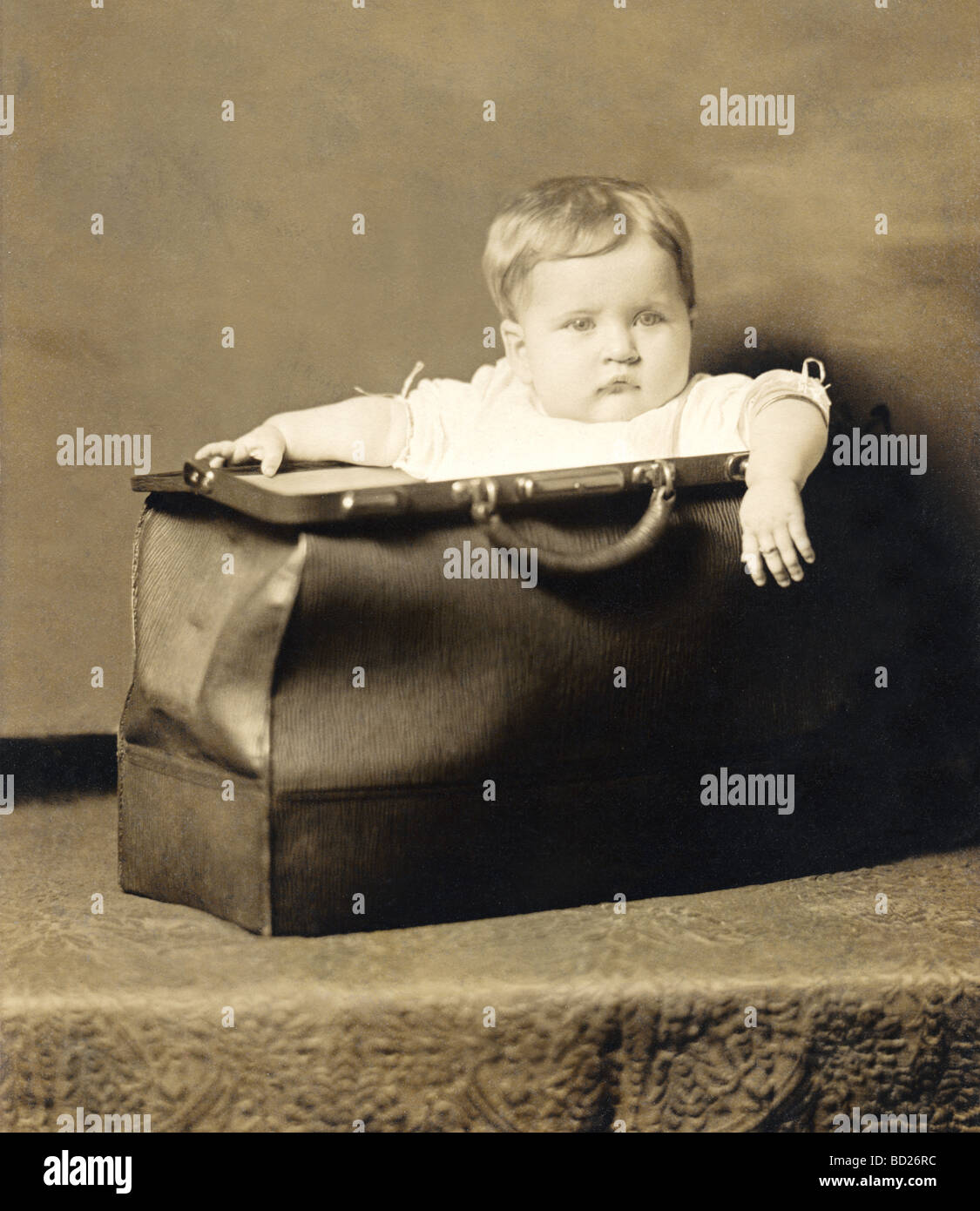 Pudgy Infant Boy Inside Medical Bag Stock Photo - Alamy
