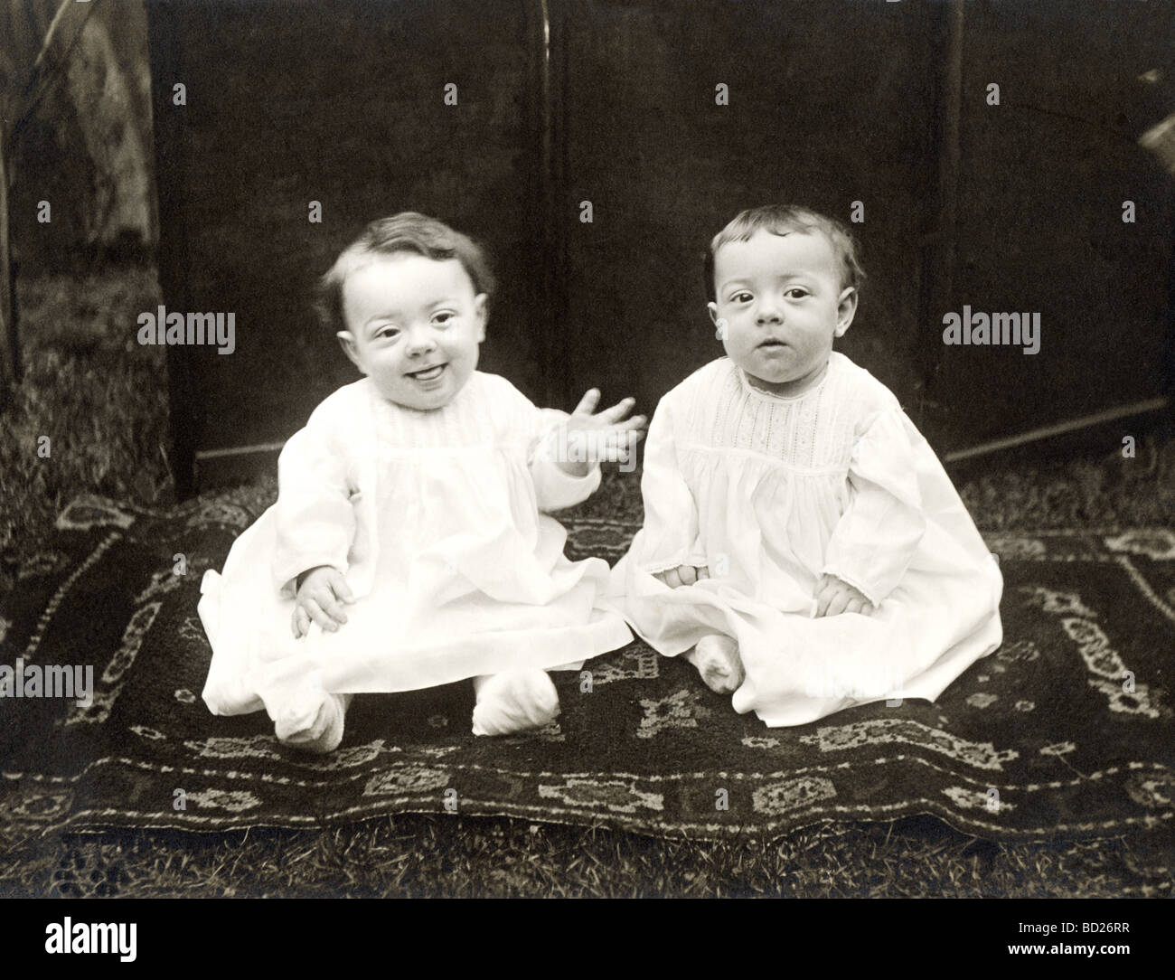 Two Very Different Infant Boys Stock Photo - Alamy