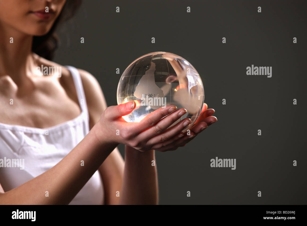 Chinese girl holding crystal ball hi-res stock photography and images ...