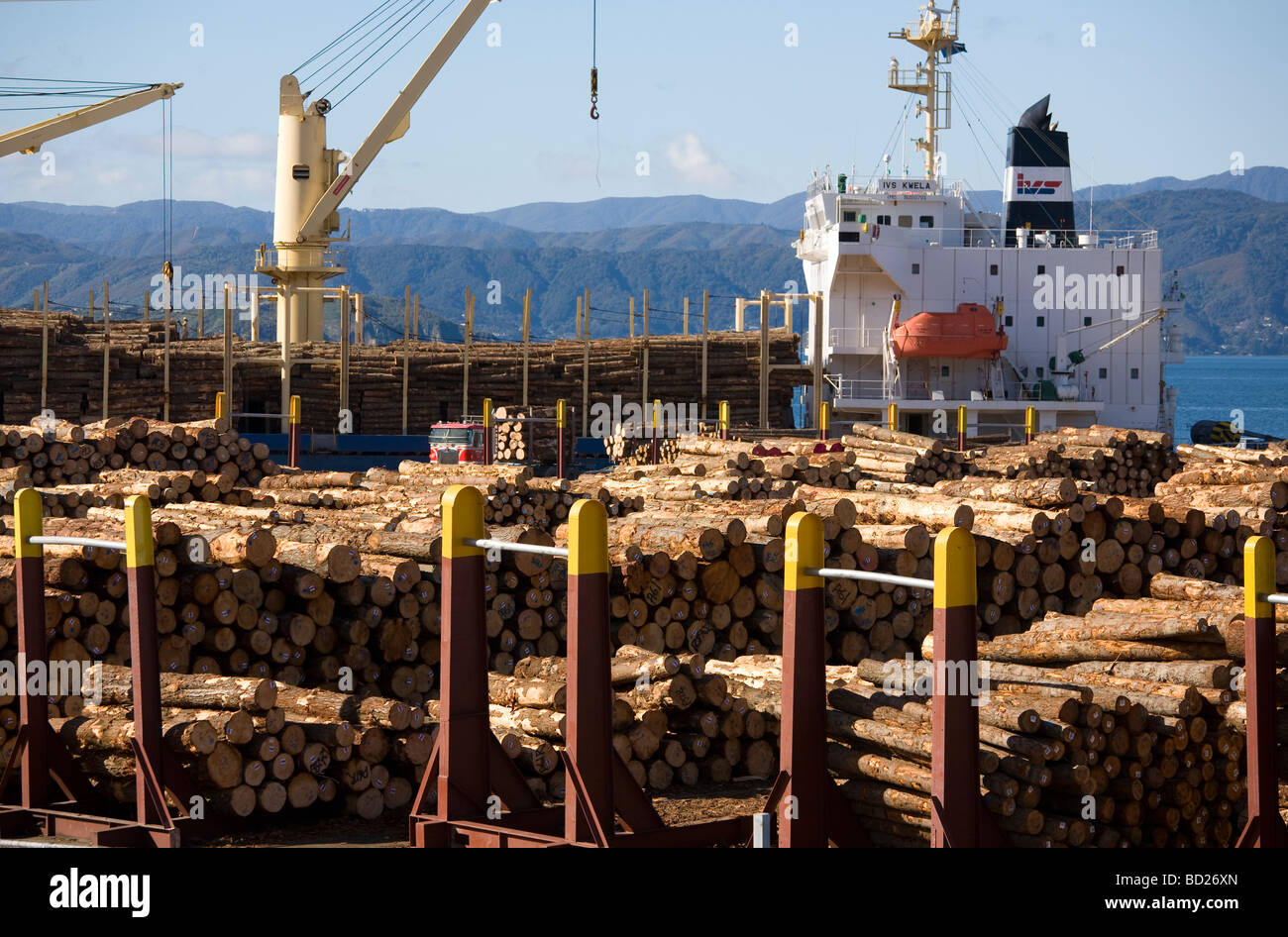 logs on wharf Stock Photo - Alamy