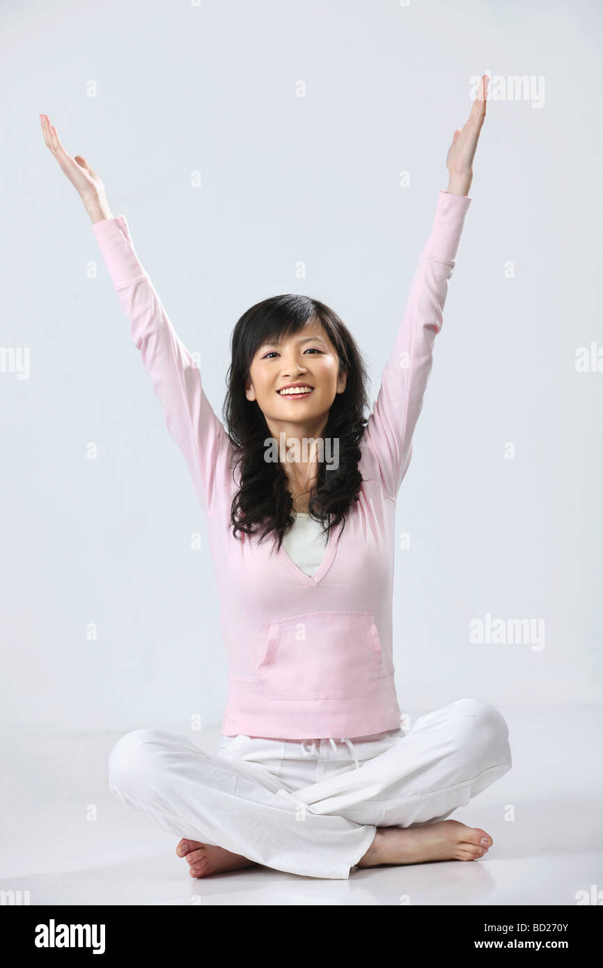 Chinese girl sitting on the floor hi-res stock photography and images ...