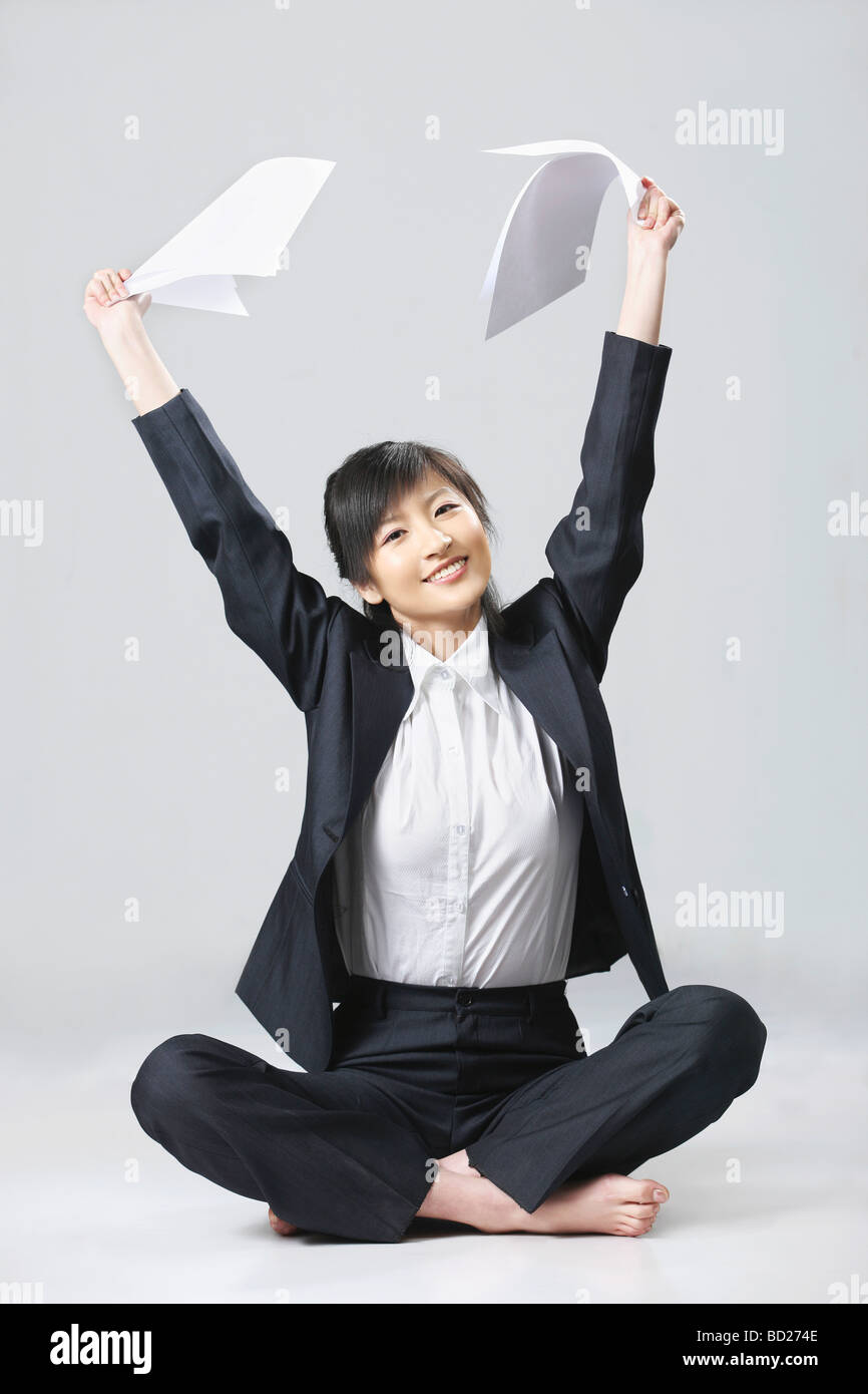 Chinese girl throwing the papers in the air,China Stock Photo - Alamy