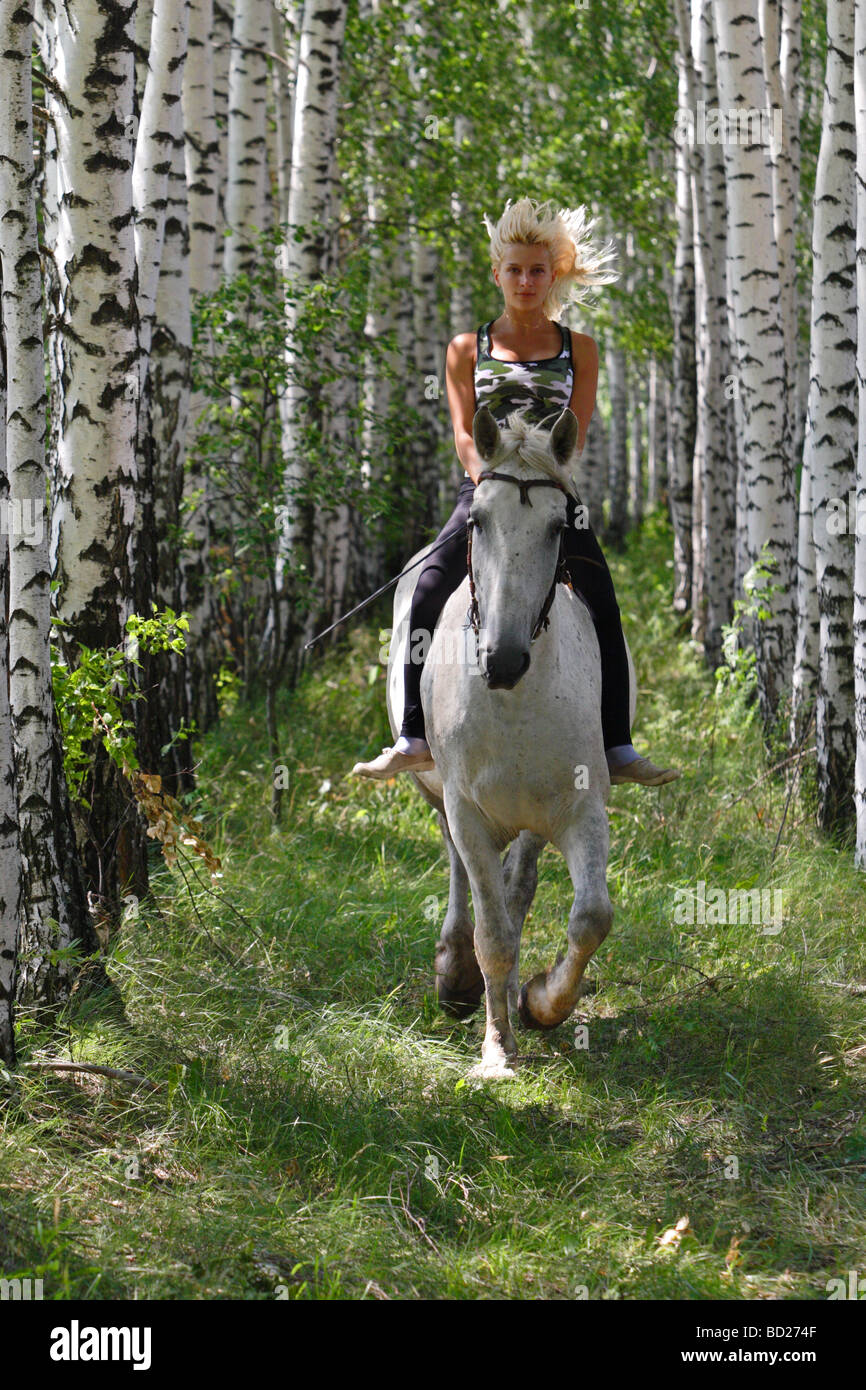 Woman horseback hi-res stock photography and images - Alamy