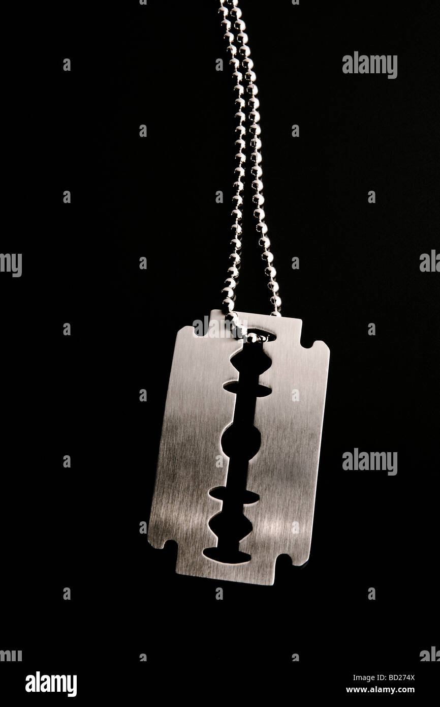 Razor blade on a chain Stock Photo - Alamy