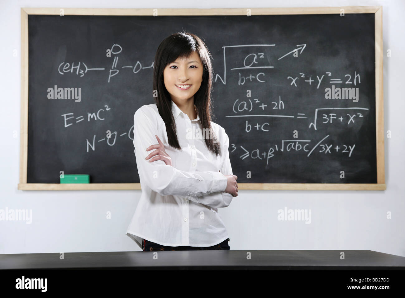 Chinese young teacher on the lesson,China Stock Photo - Alamy