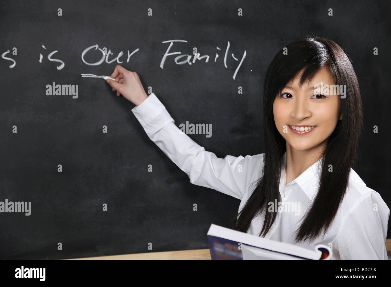 Chinese young teacher on the lesson,China Stock Photo - Alamy