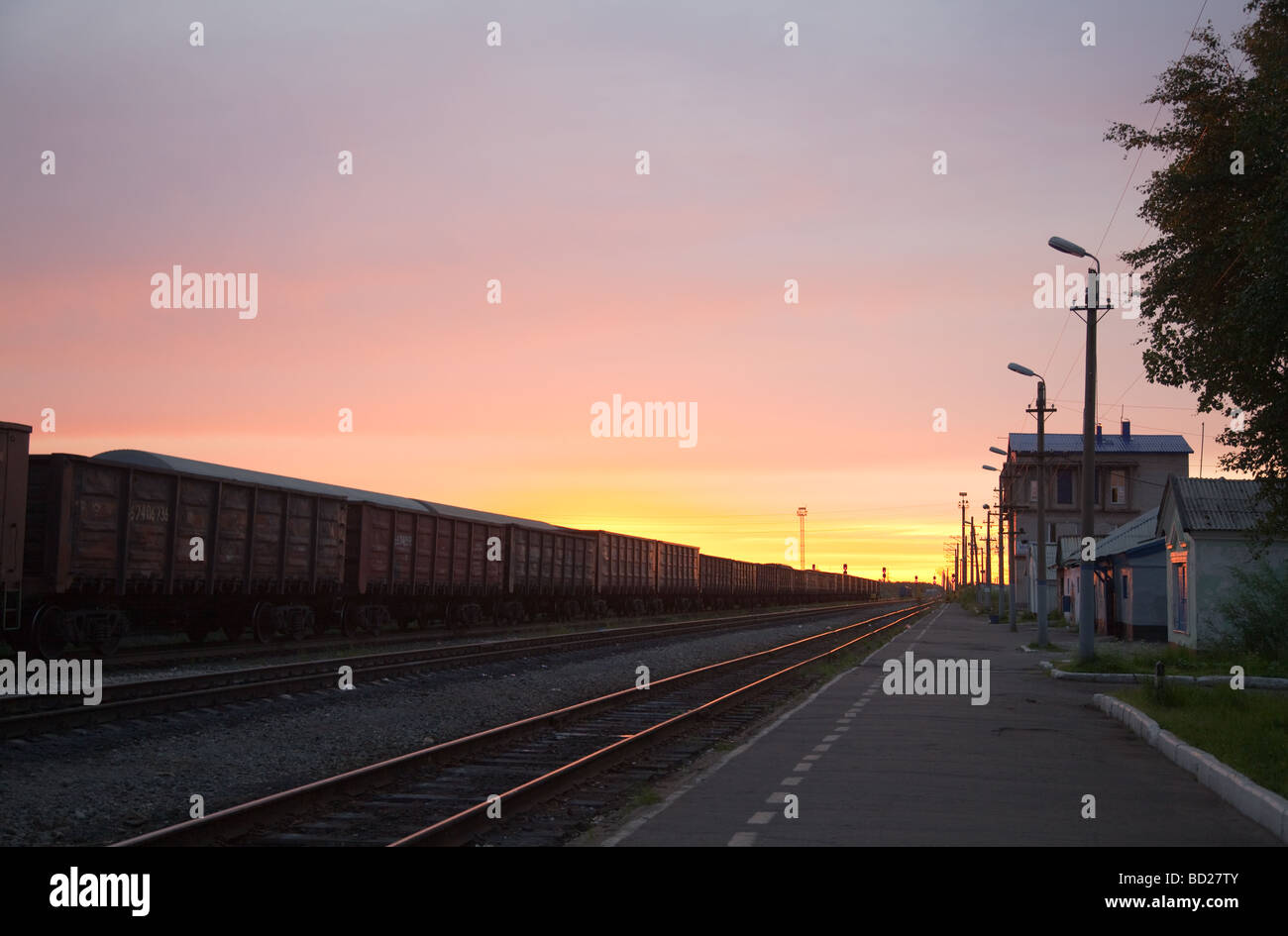 Sunrise on Polar railway station in summer, Inta, Russia Stock Photo ...