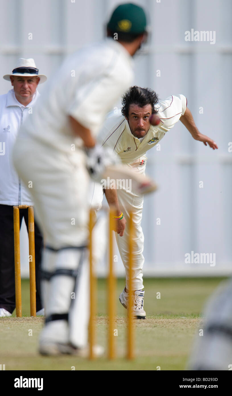 Cambridge CCC fast bowler in action Stock Photo - Alamy