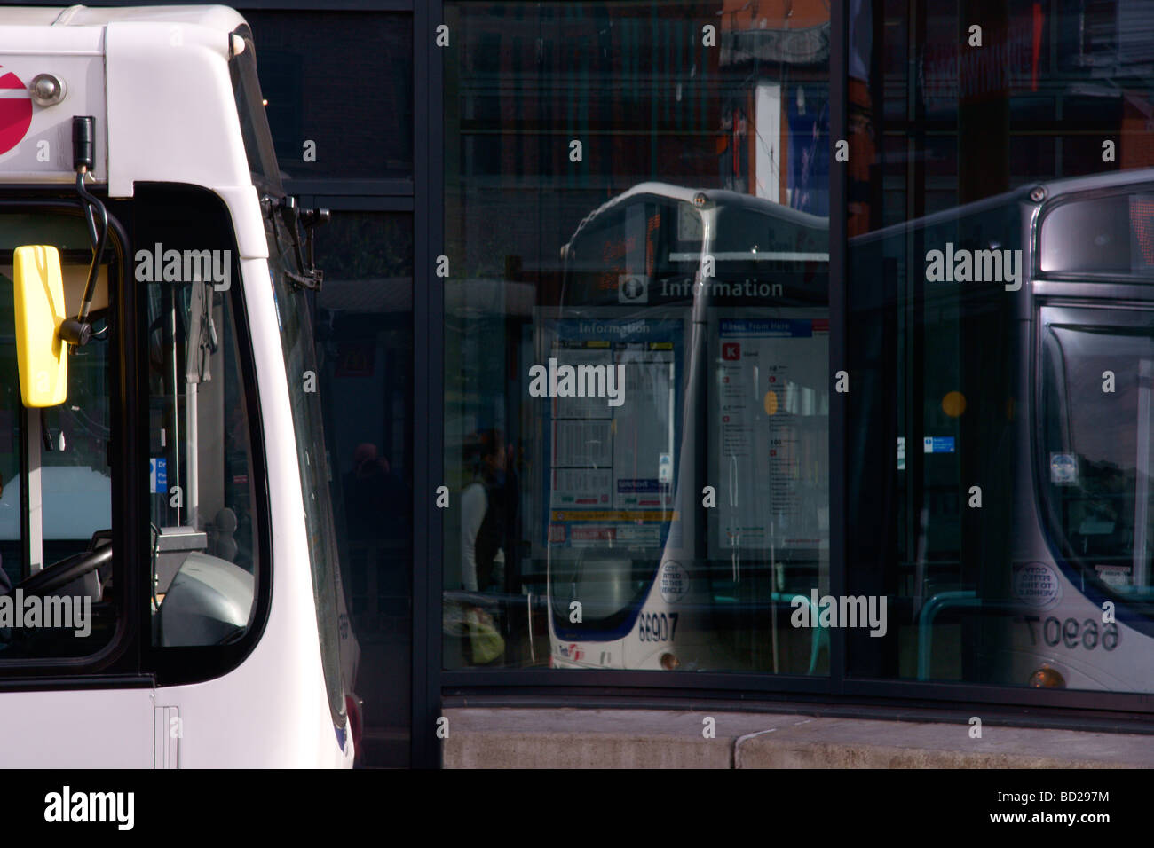 Bus with its own multiple reflections in Bus Station windows Stock ...